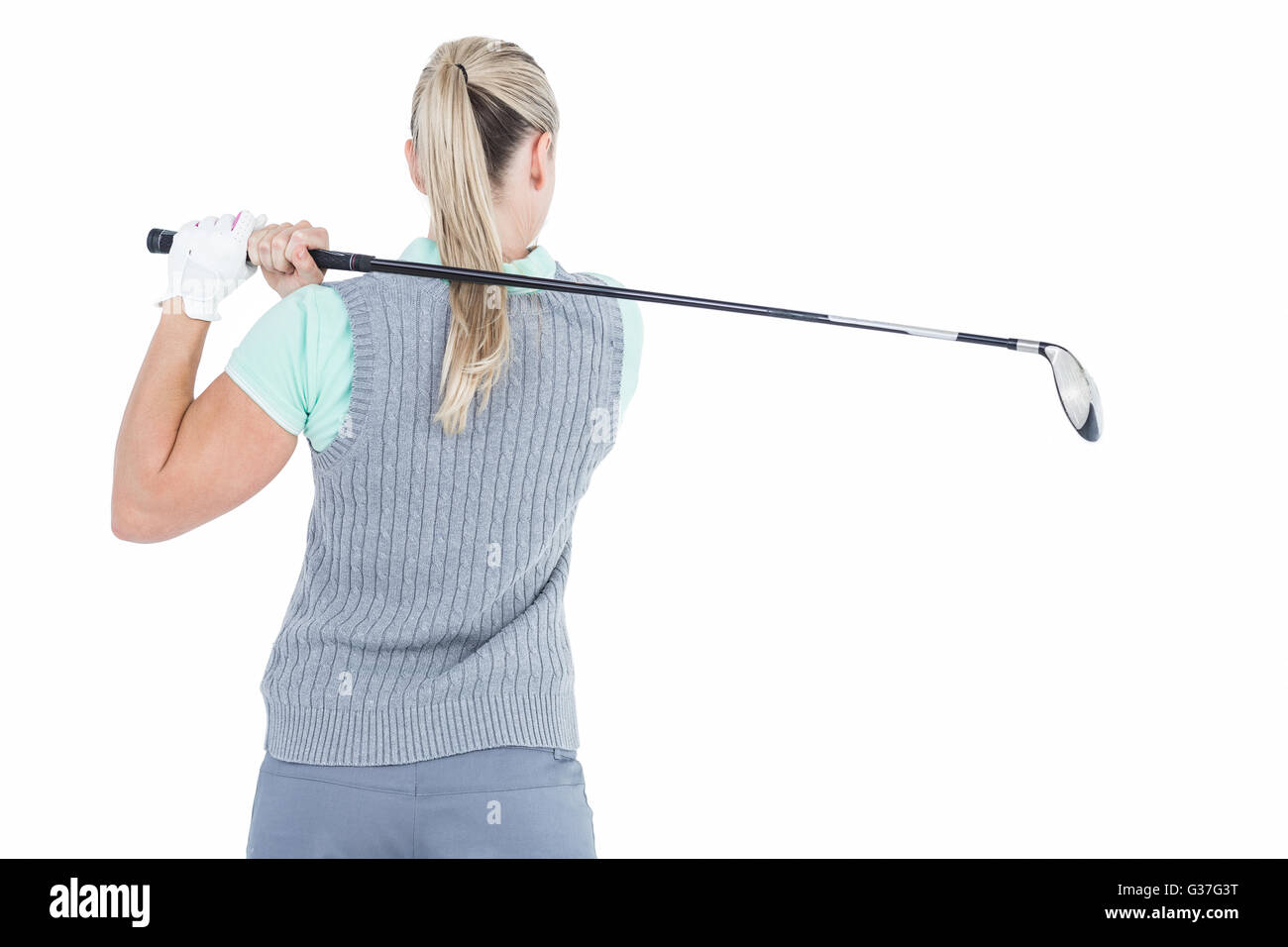 Pretty blonde playing golf Stock Photo - Alamy
