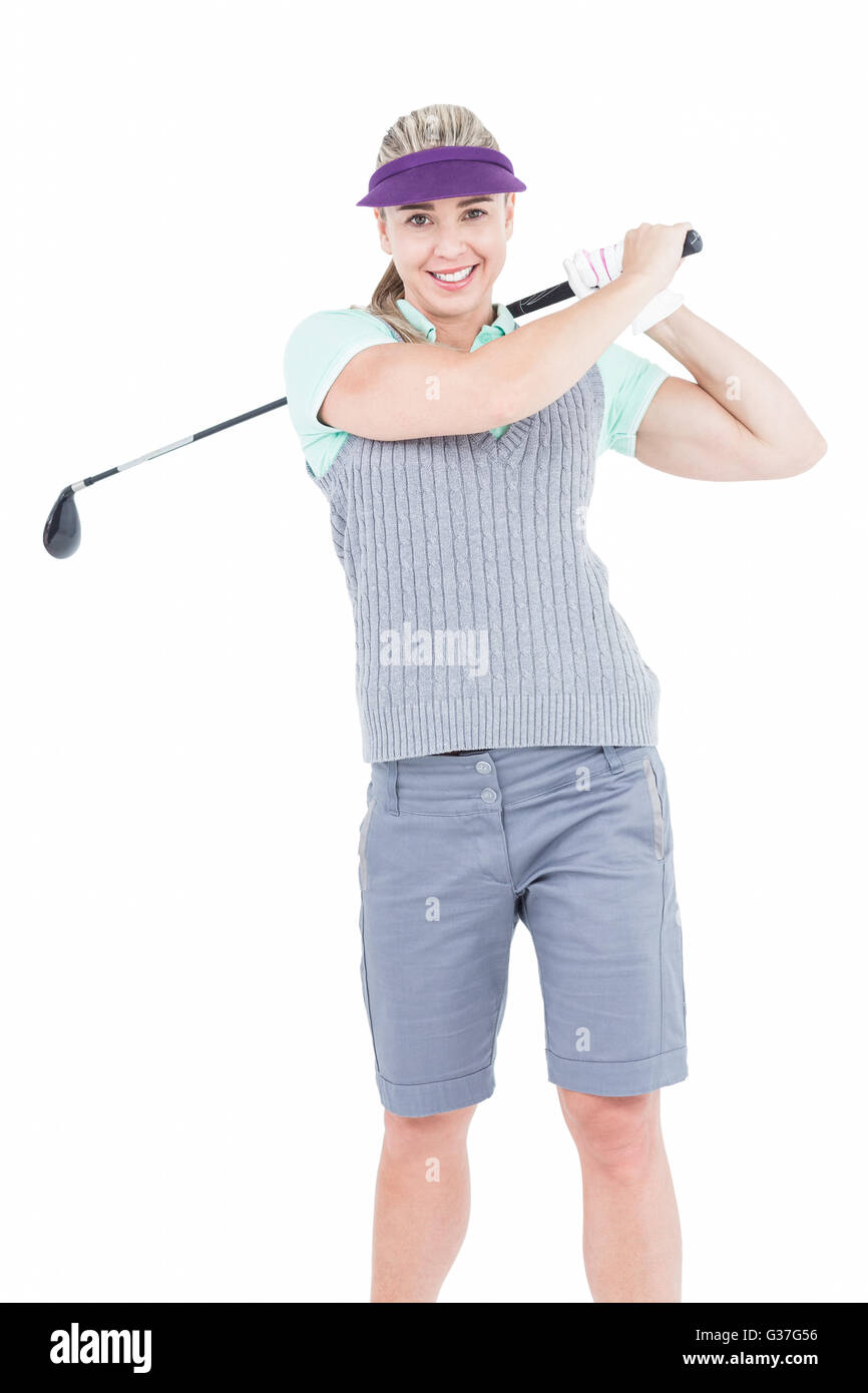 Pretty blonde playing golf Stock Photo - Alamy