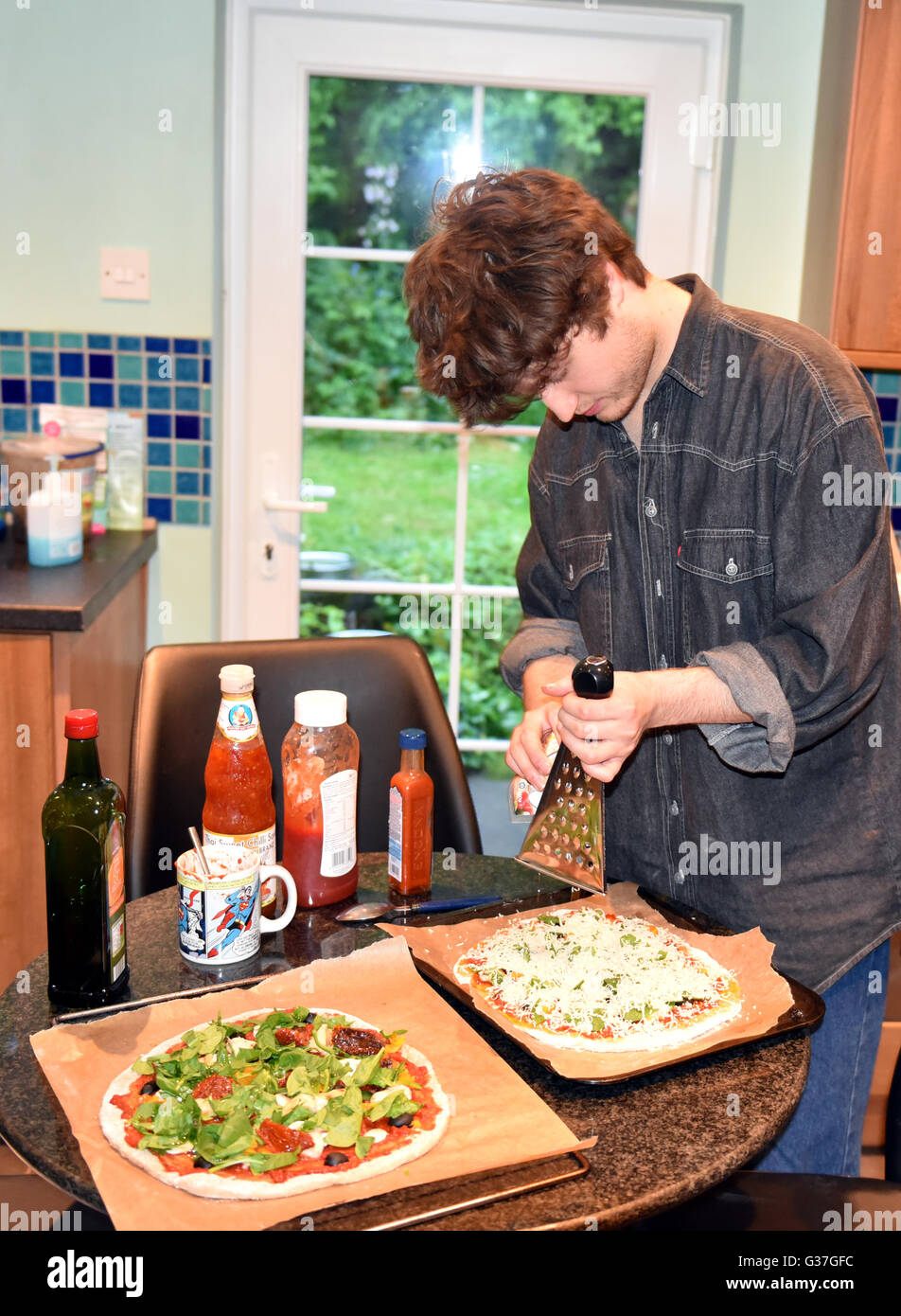 Grating cheese pizza hi-res stock photography and images - Alamy