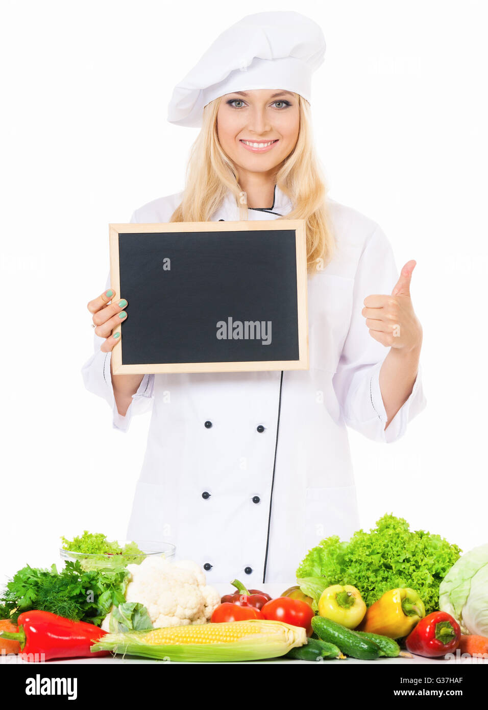 Woman cook with small blackboard Stock Photo - Alamy