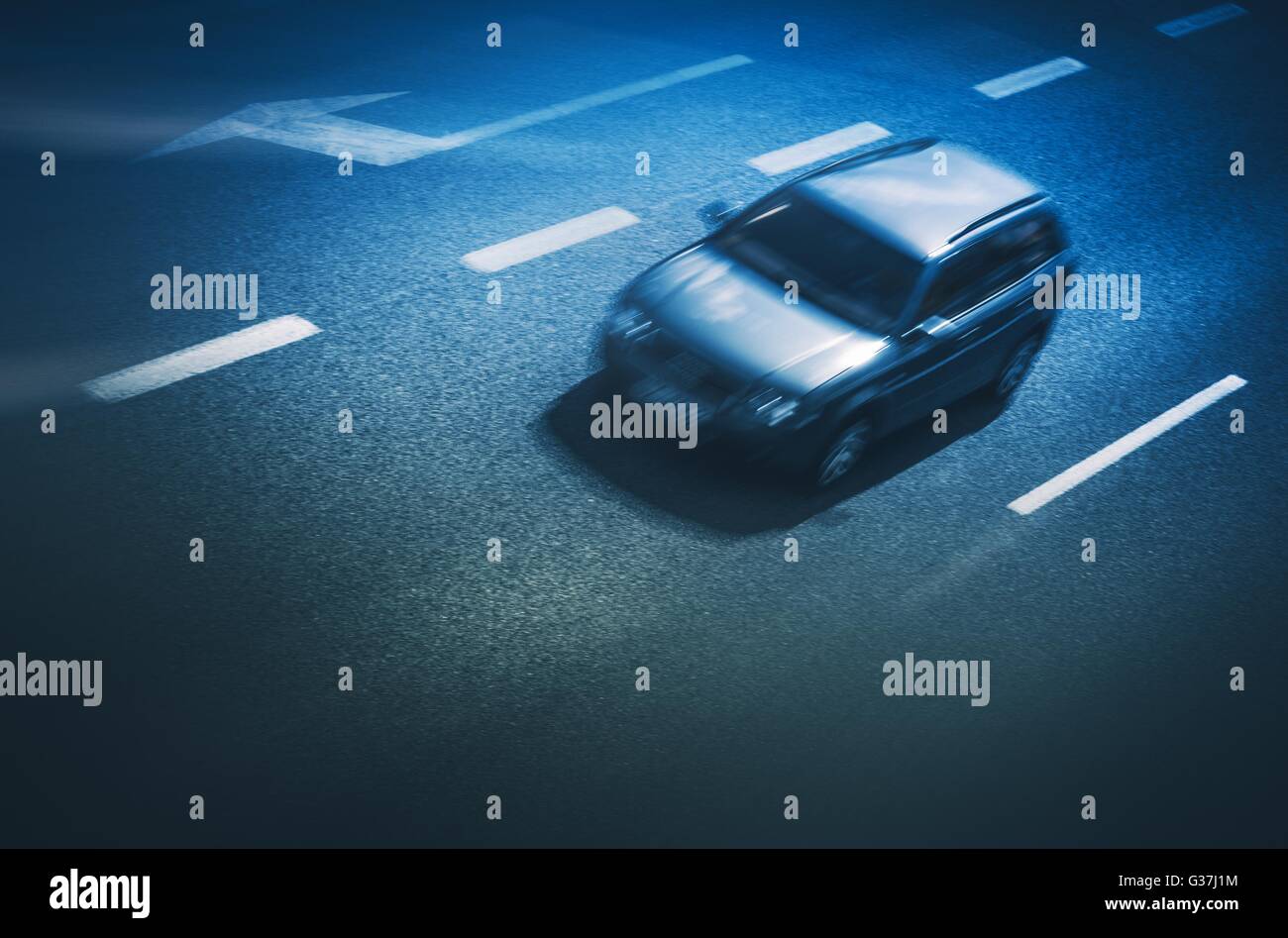 Speeding Car on the Highway. Evening Blue Color Grading Stock Photo - Alamy