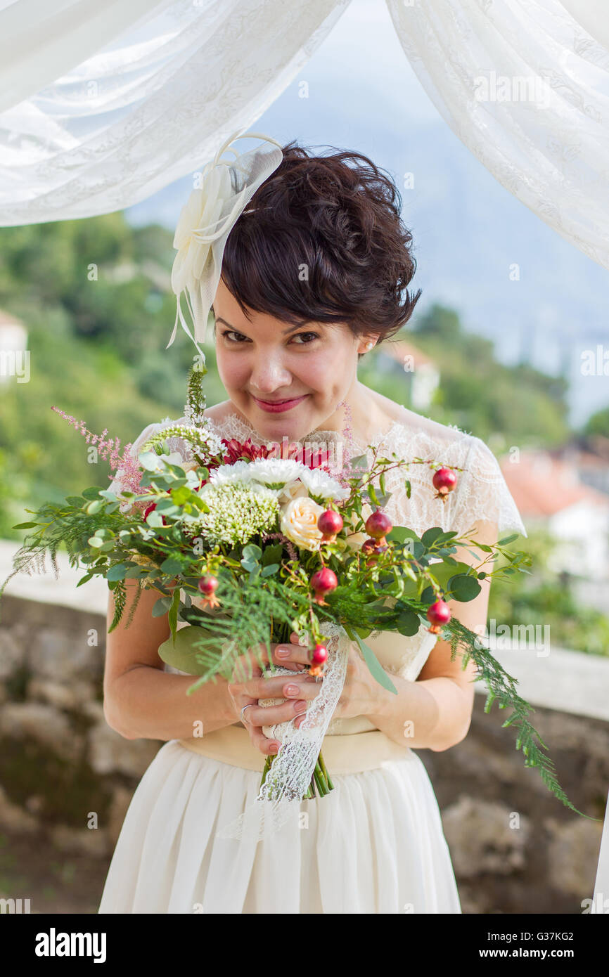 Portrait of a pleased pretty bride Stock Photo - Alamy