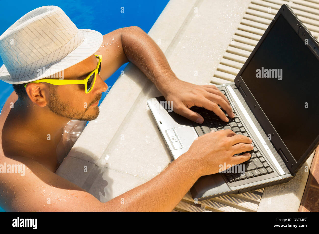 Work from swimming pool hi-res stock photography and images - Alamy