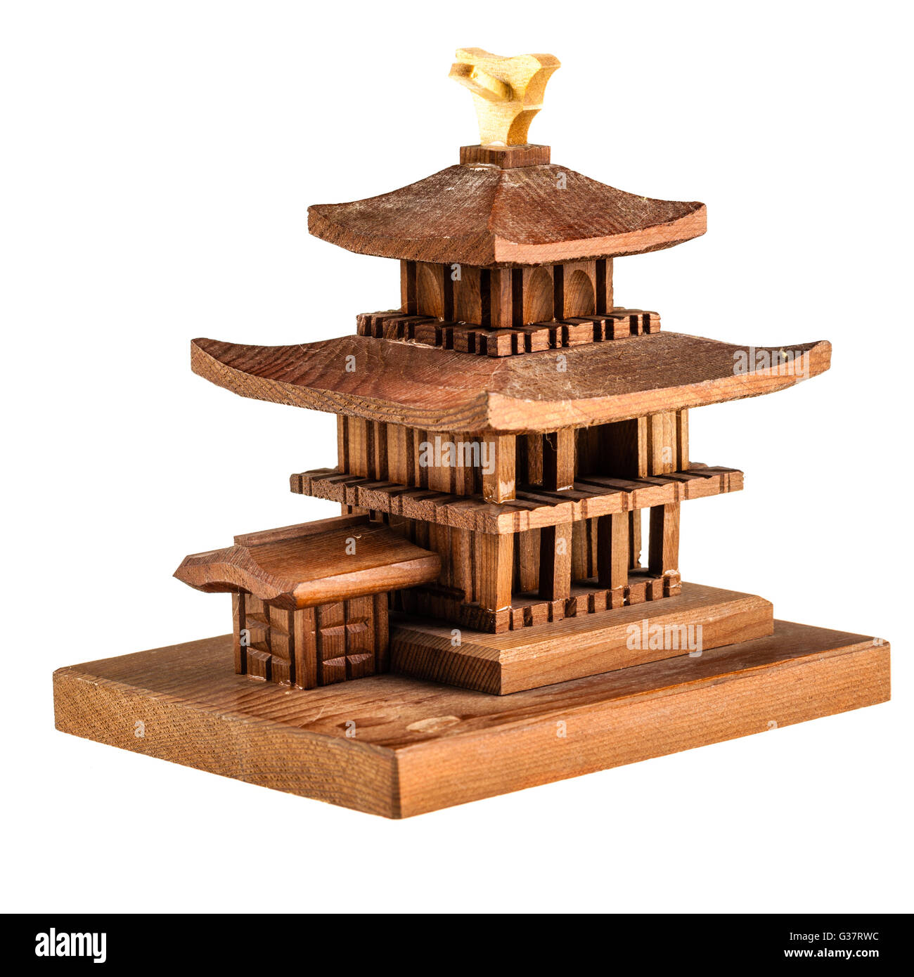 a small chinese wooden temple model isolated over a white background ...