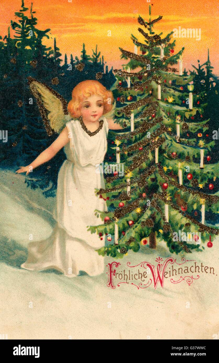 Angel and Tree Stock Photo - Alamy