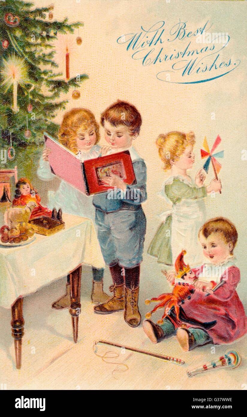 Four children sit stand the tree hi-res stock photography and images ...