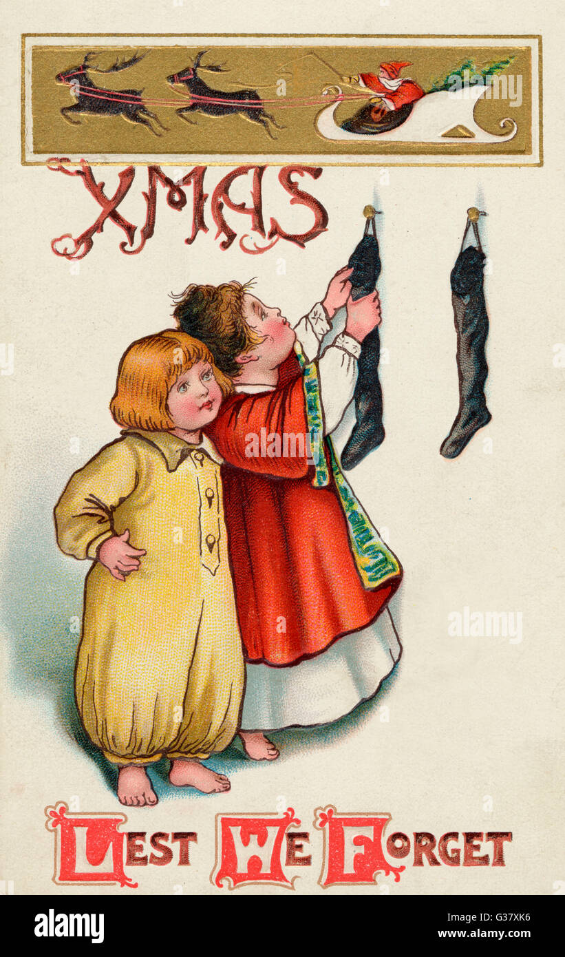 Children hanging up christmas stockings hi-res stock photography and ...