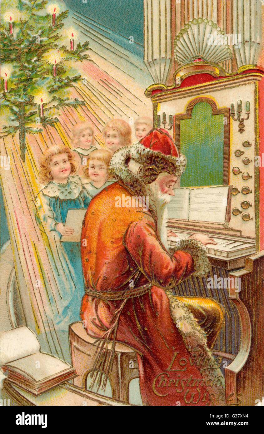 Santa(Father Christmas)plays the organ Stock Photo - Alamy