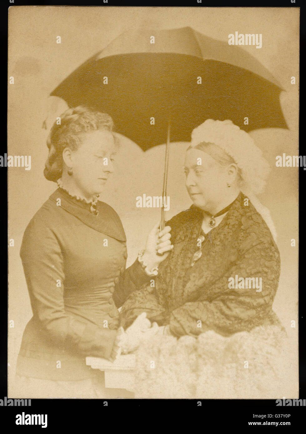 Queen Victoria with Princess Beatrice and umbrella, 1878 Stock Photo ...