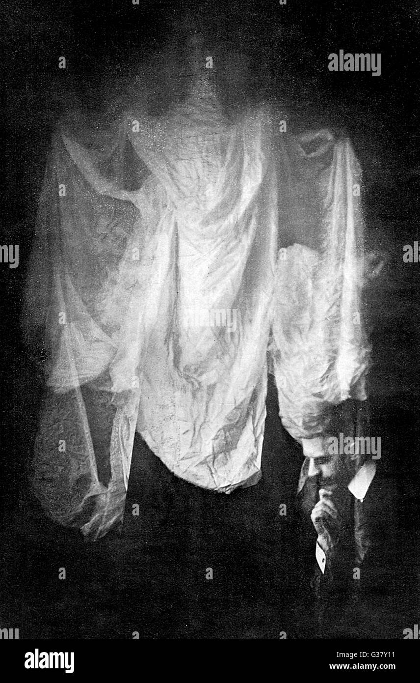 Paranormal: William S. Marriott simulates a spirit form Stock Photo - Alamy