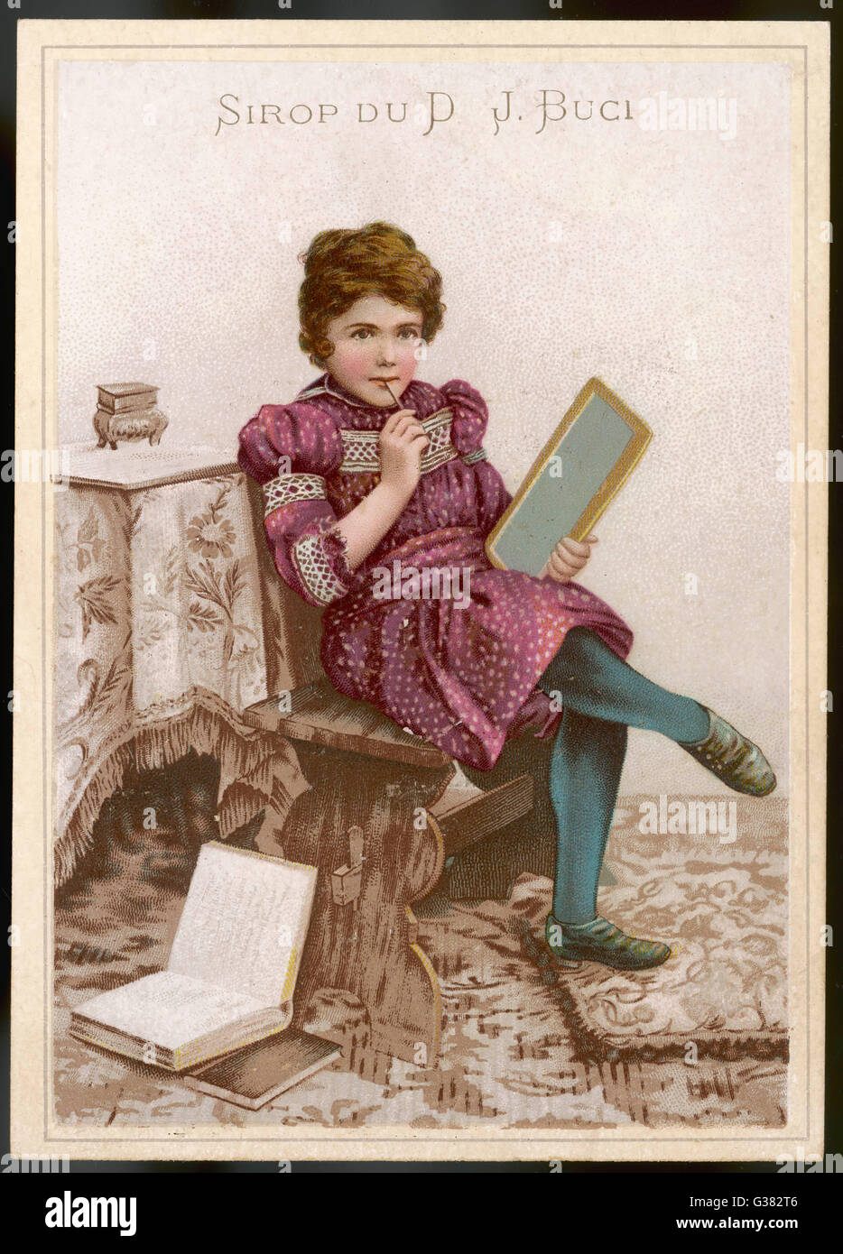 A thoughtful girl uses her slate for her school homework Date: circa ...