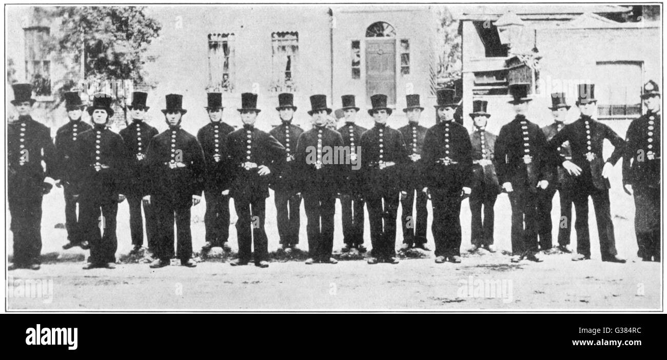 A row of smartly dressed Victorian policemen standing outside Catford ...