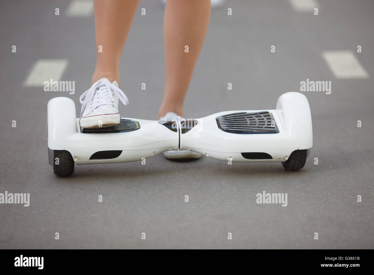 Balancing on board with feet hi-res stock photography and images - Alamy