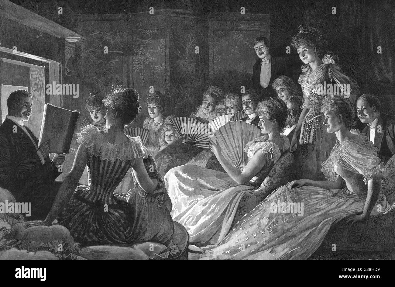 Reading a story Black and White Stock Photos & Images - Alamy