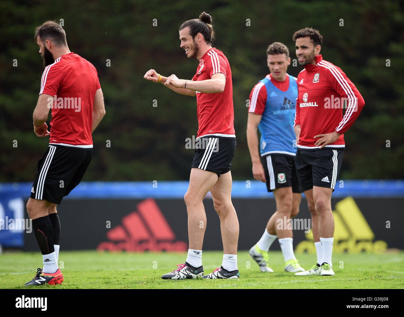 Wales' (left to right) Joe Ledley, Gareth Bale, James Chester and Hal ...