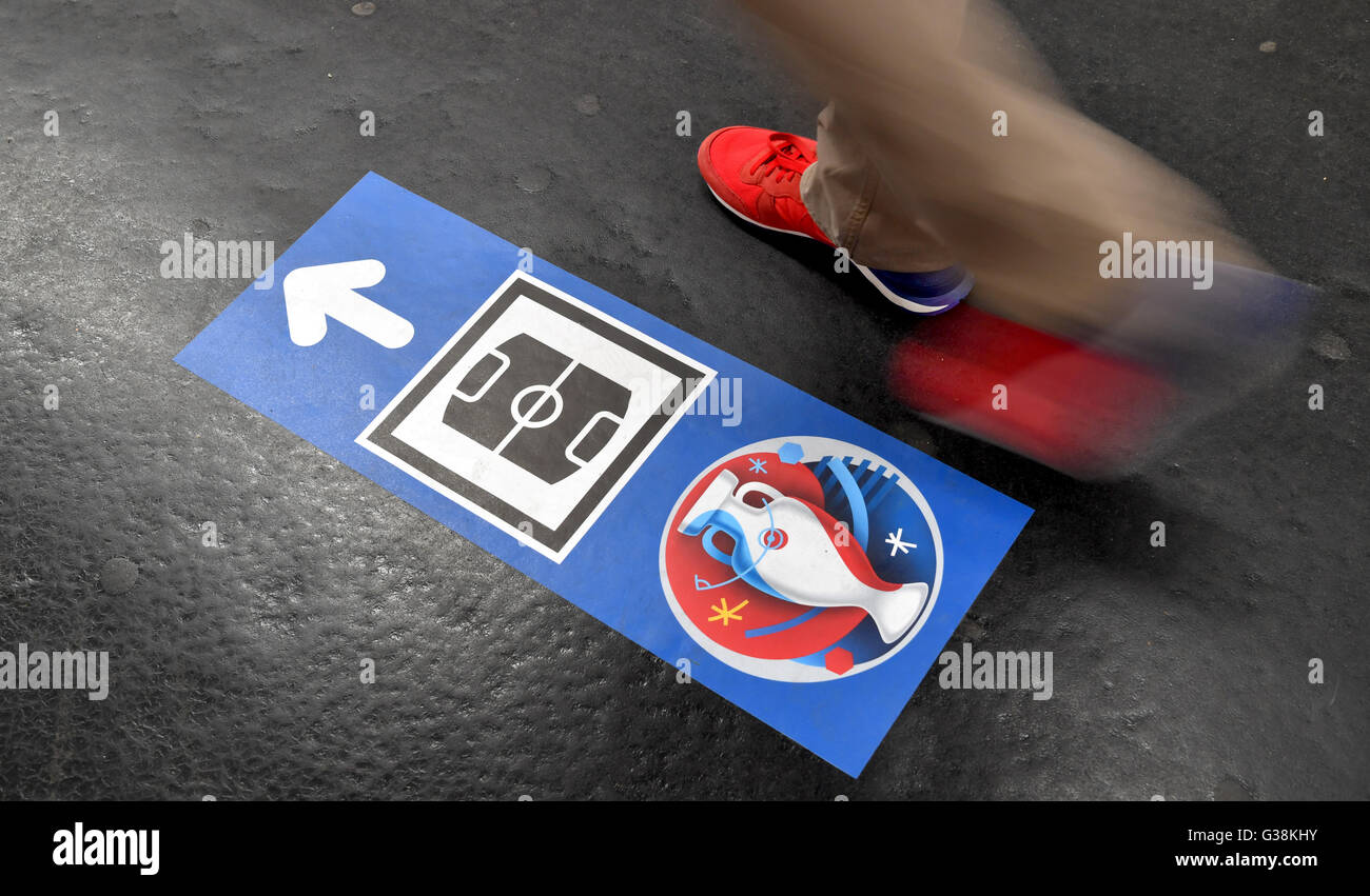 A sign which shows the direction to the Parc de Princes stadium is seen ...