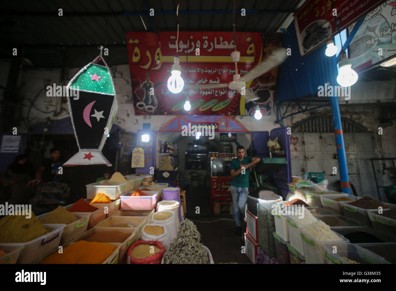 Palestinian vendors display different models of food, candy, meats ...