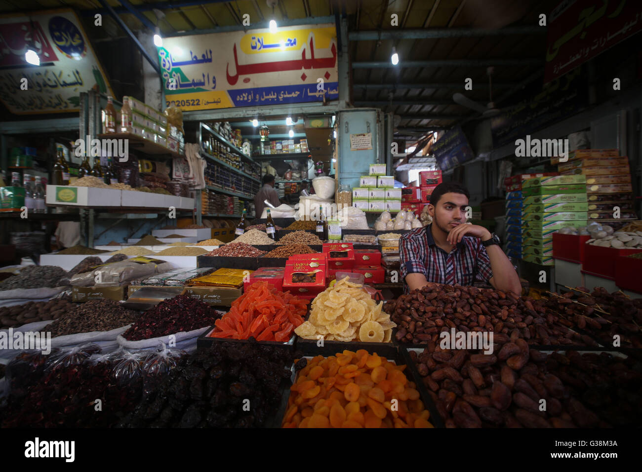 Palestinian vendors display different models of food, candy, meats ...