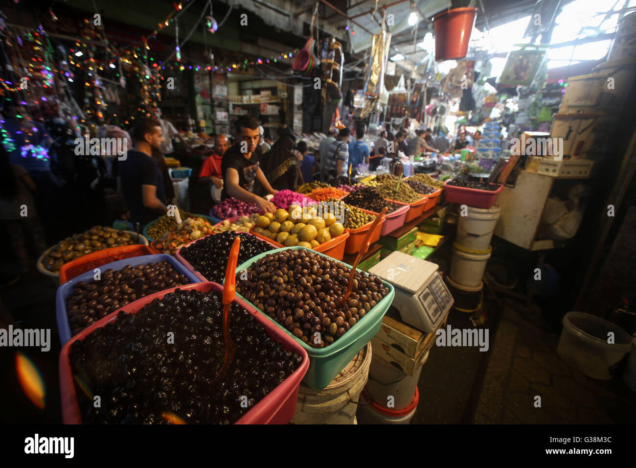 Palestinian vendors display different models of food, candy, meats ...