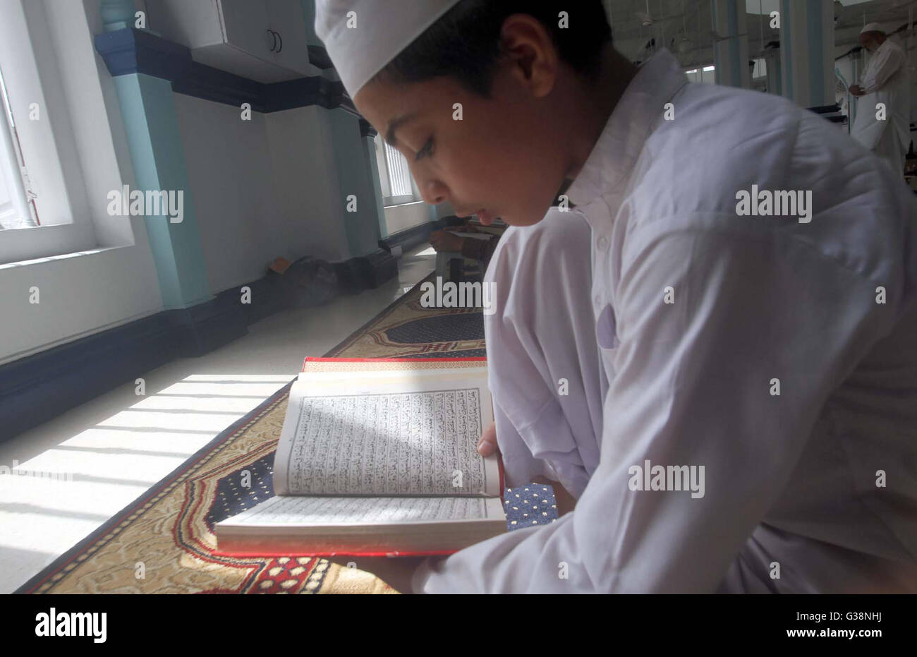 Quran reciting hi-res stock photography and images - Alamy