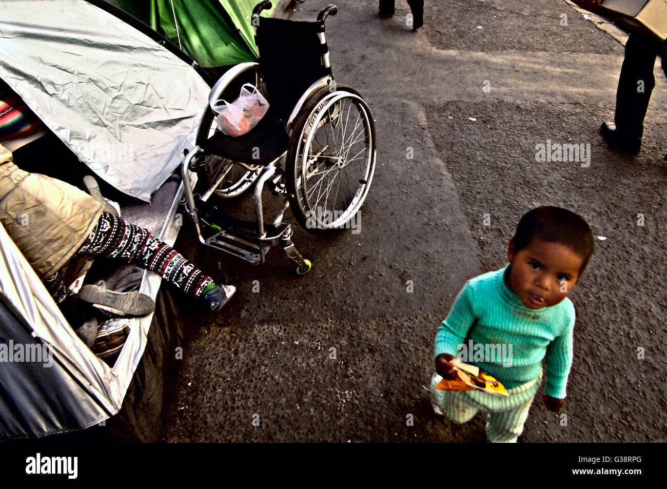 La Paz, Bolivia. 2nd June, 2016. A Handicapped people child goes ...