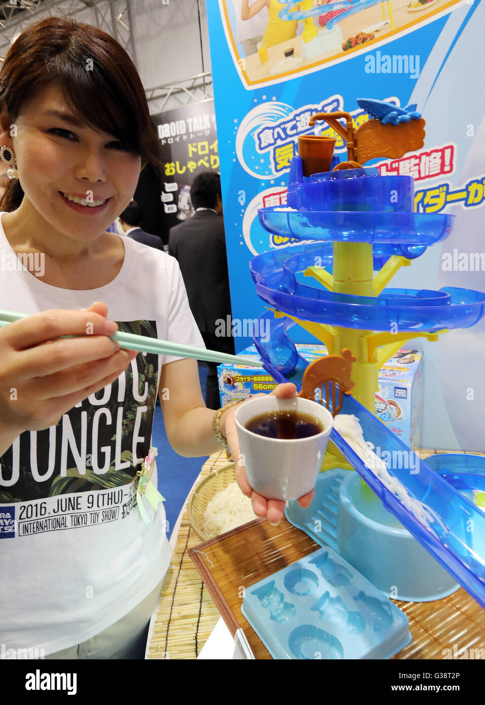Tokyo, Japan. 9th June, 2016. An employee of Japanese toy maker Tomy ...