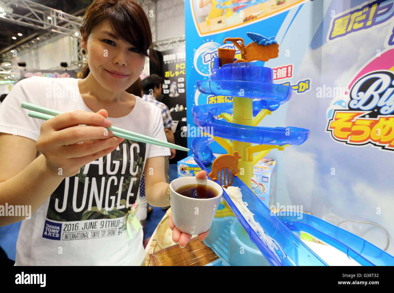 Tokyo, Japan. 9th June, 2016. An employee of Japanese toy maker Tomy ...