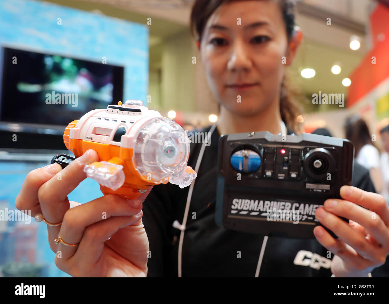 Tokyo, Japan. 9th June, 2016. An employee of Japanese toy maker CCP ...