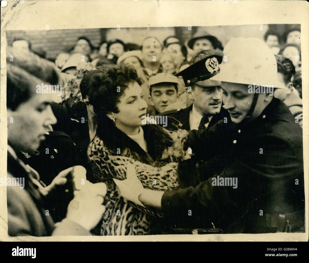 1965 - Actress police leopard skin coat fur © Keystone Pictures USA ...