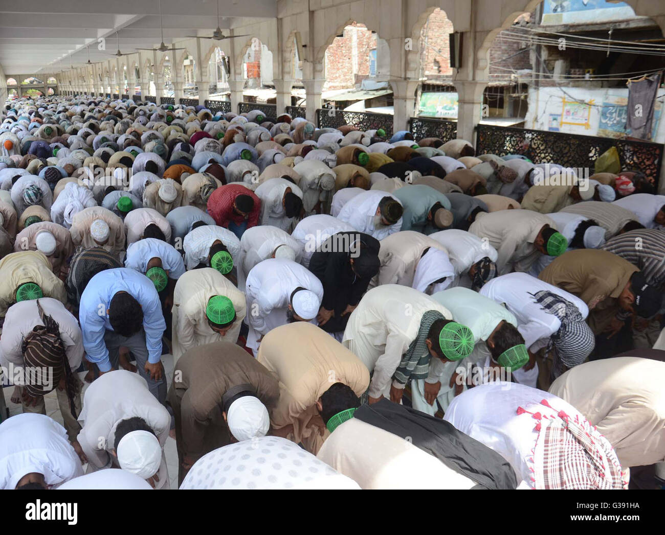 Muslims offering Salat-e-Jumma prayer on the eve of first Friday during ...