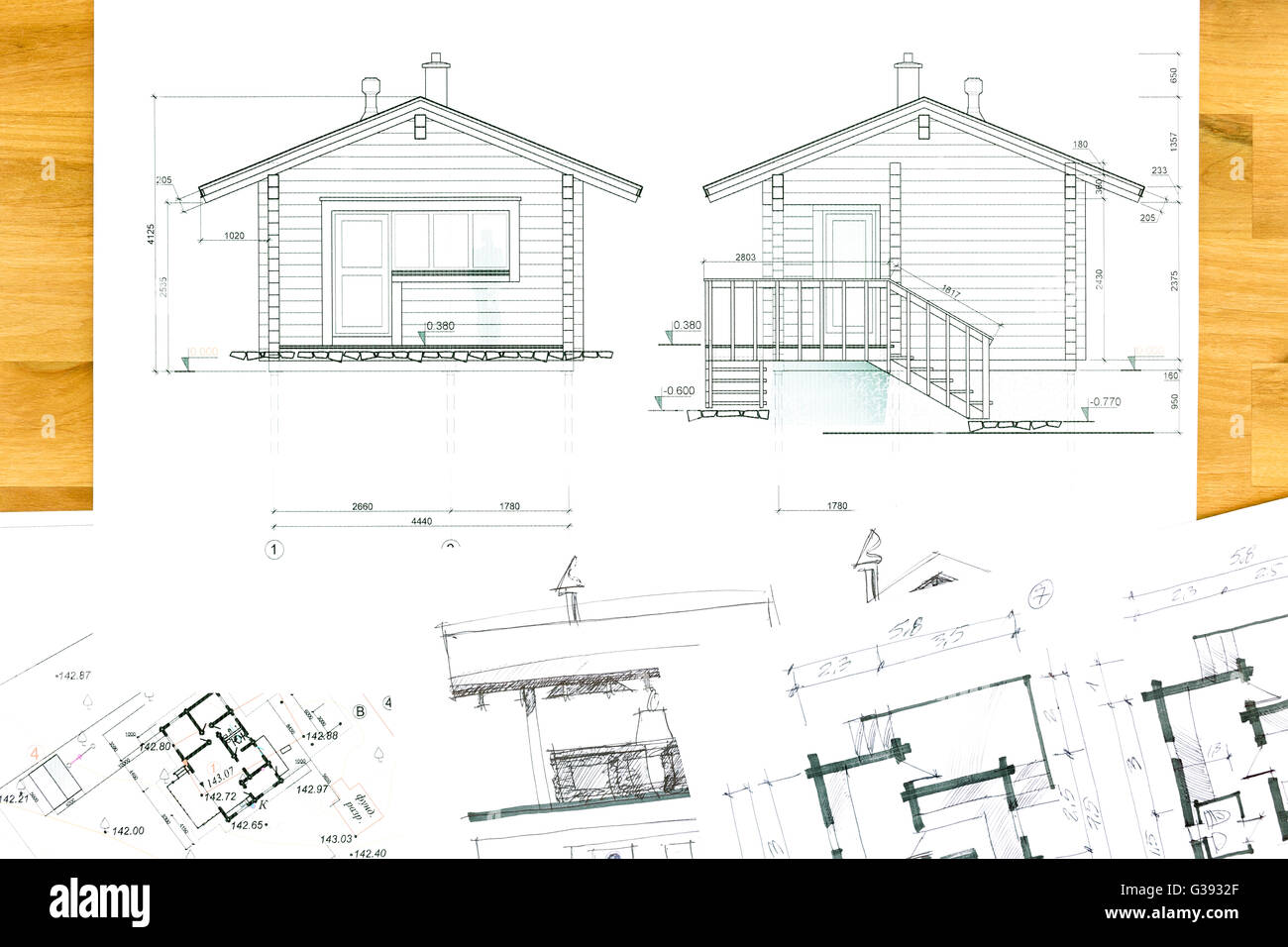 home renovation concept with blueprints and architectural hand drawings ...