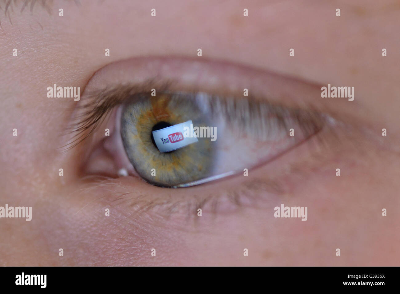 Eye showing Youtube symbol Stock Photo - Alamy