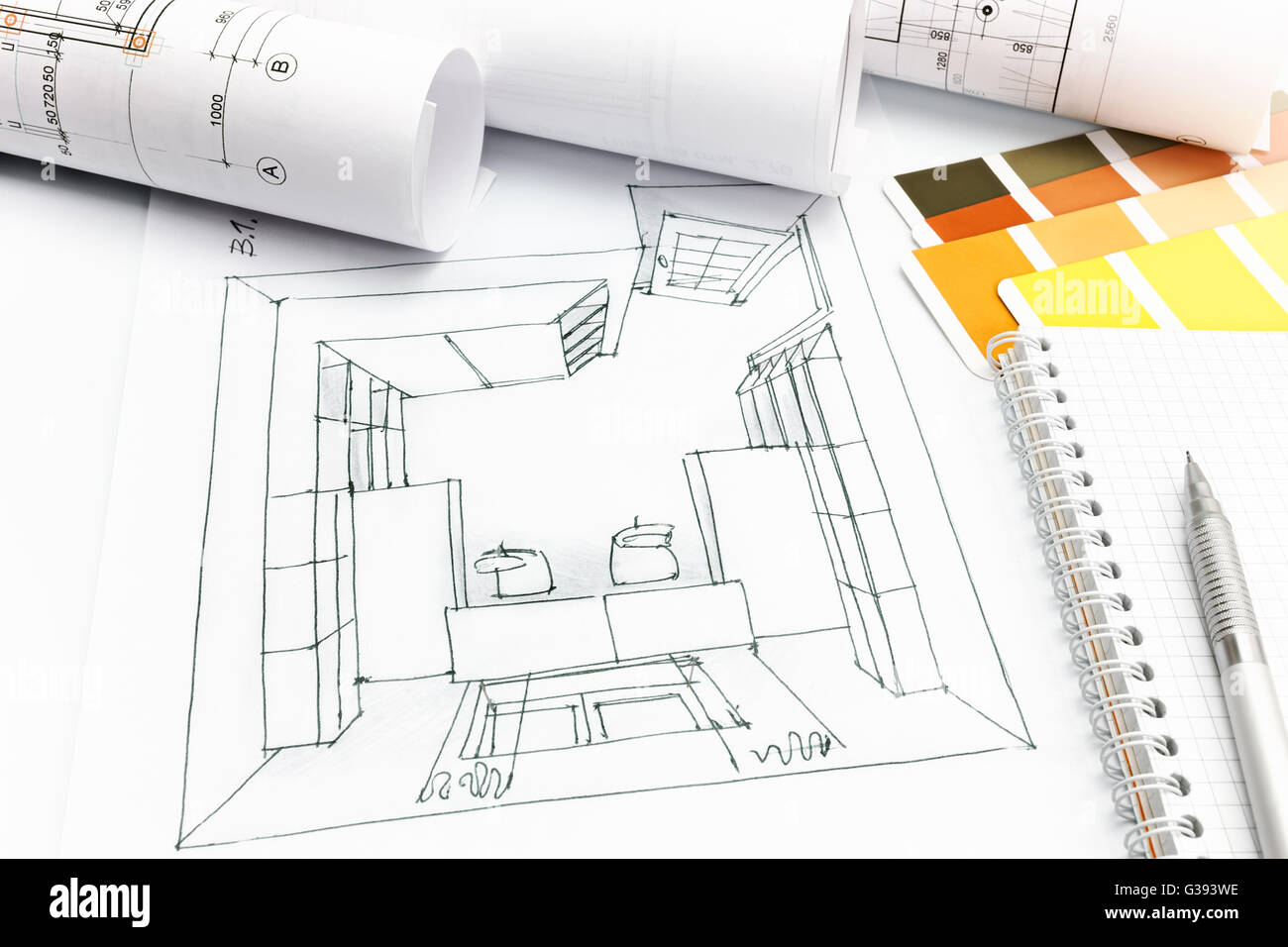 vision of designers hand-drawn top view sketch and blueprints rolls ...