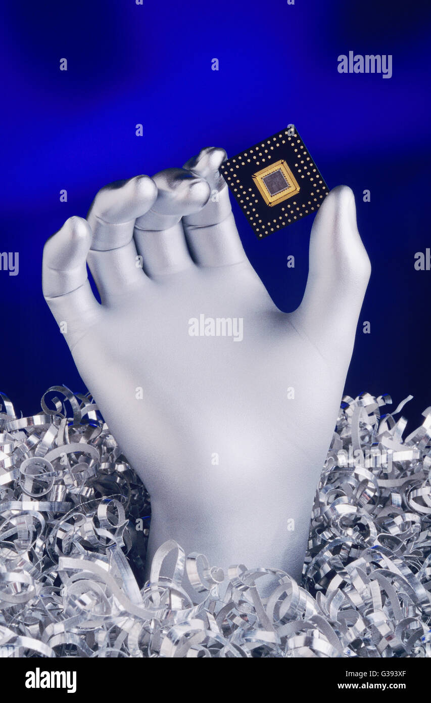 Silver Hand holding a Computer Chip Stock Photo - Alamy