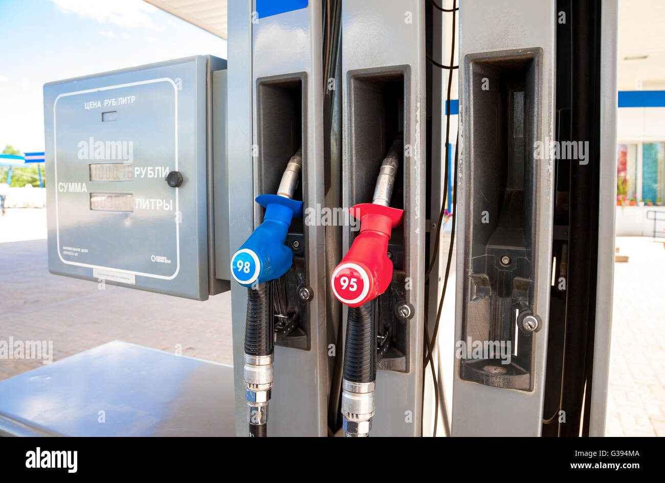 Filling the column with different fuels at the gas station Stock Photo ...