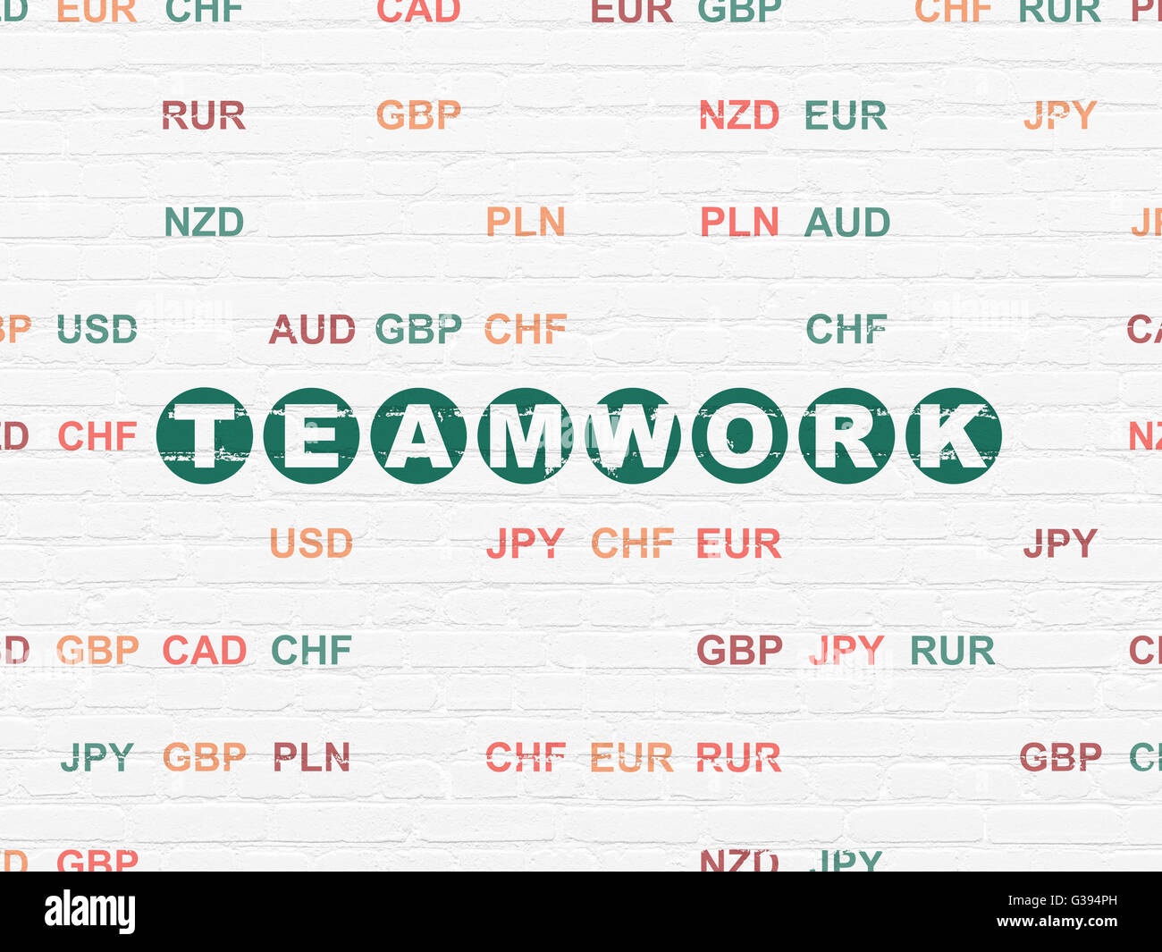 Finance concept: Teamwork on wall background Stock Photo - Alamy