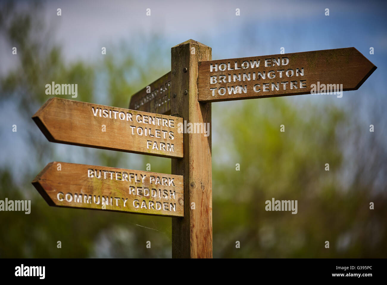 Reddish Vale Stockport country park sign post destination wooden town ...