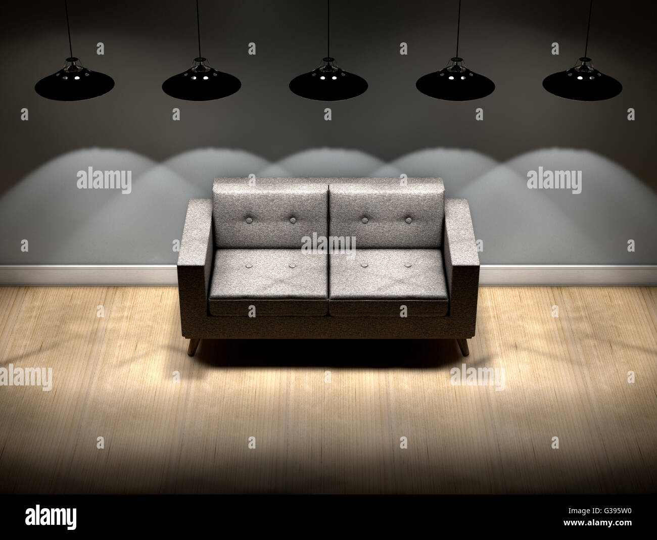 A modern couch in an empty room lit by retro light fittings Stock Photo ...