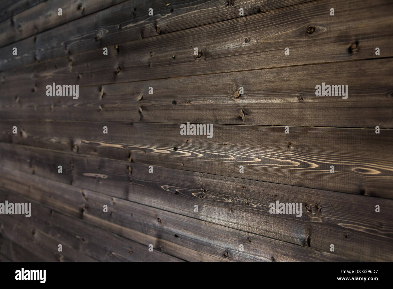 Brown burnt color wooden wall background texture Stock Photo - Alamy