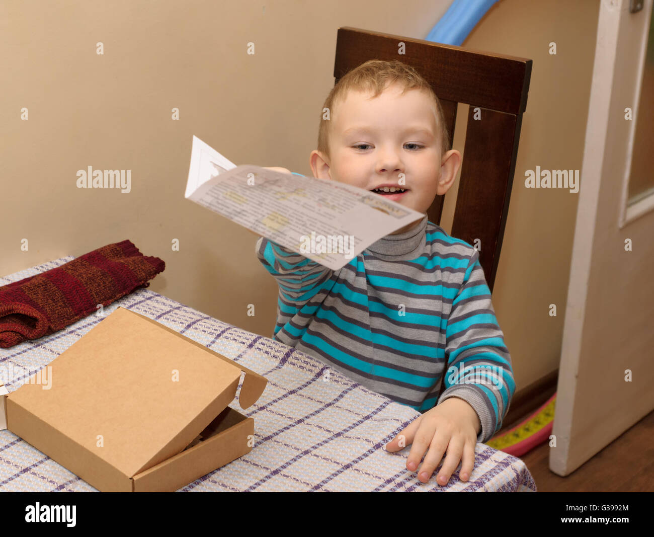 Boy in a box hi-res stock photography and images - Alamy