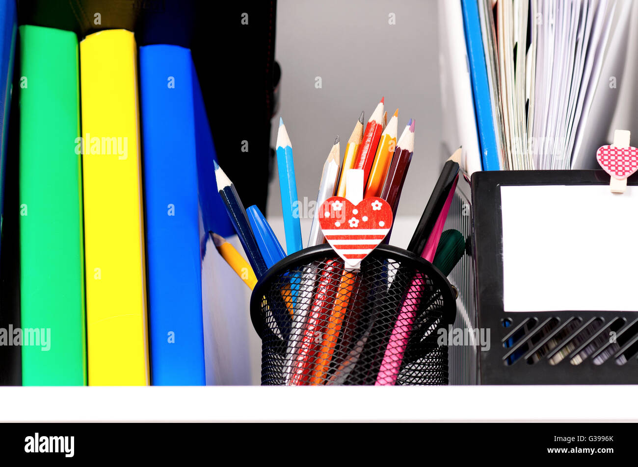 Colorful pencils on shelf Stock Photo - Alamy