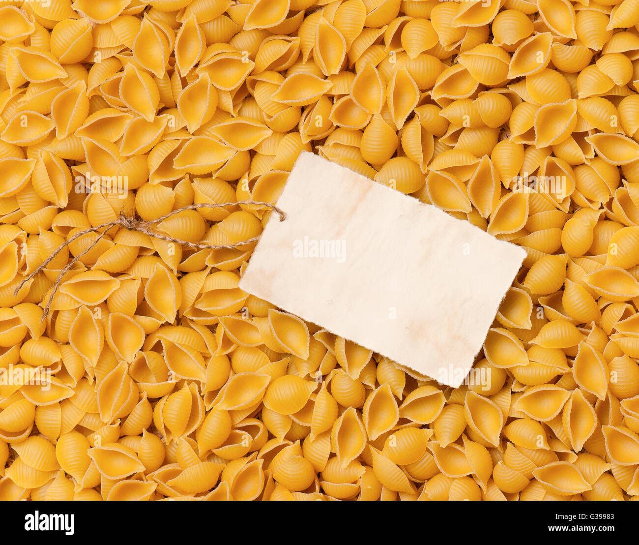 Old empty paper on raw pasta Stock Photo - Alamy