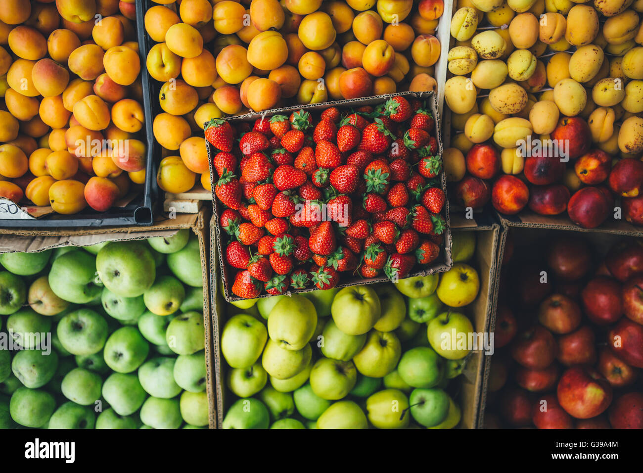 fruits and berries are in cardboard boxes Stock Photo - Alamy