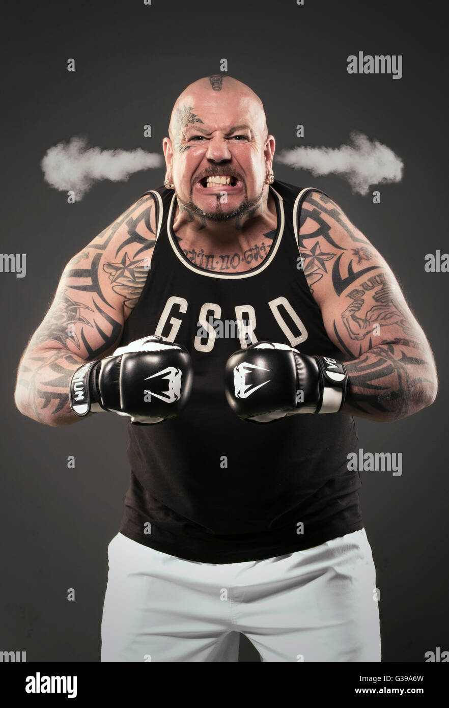 Angry cage fighter with steam coming out of ears. Metaphorical image ...