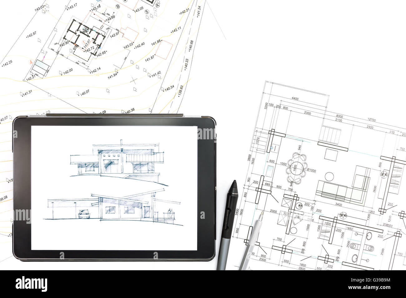tablet computer over interior and architectural drawing Stock Photo - Alamy