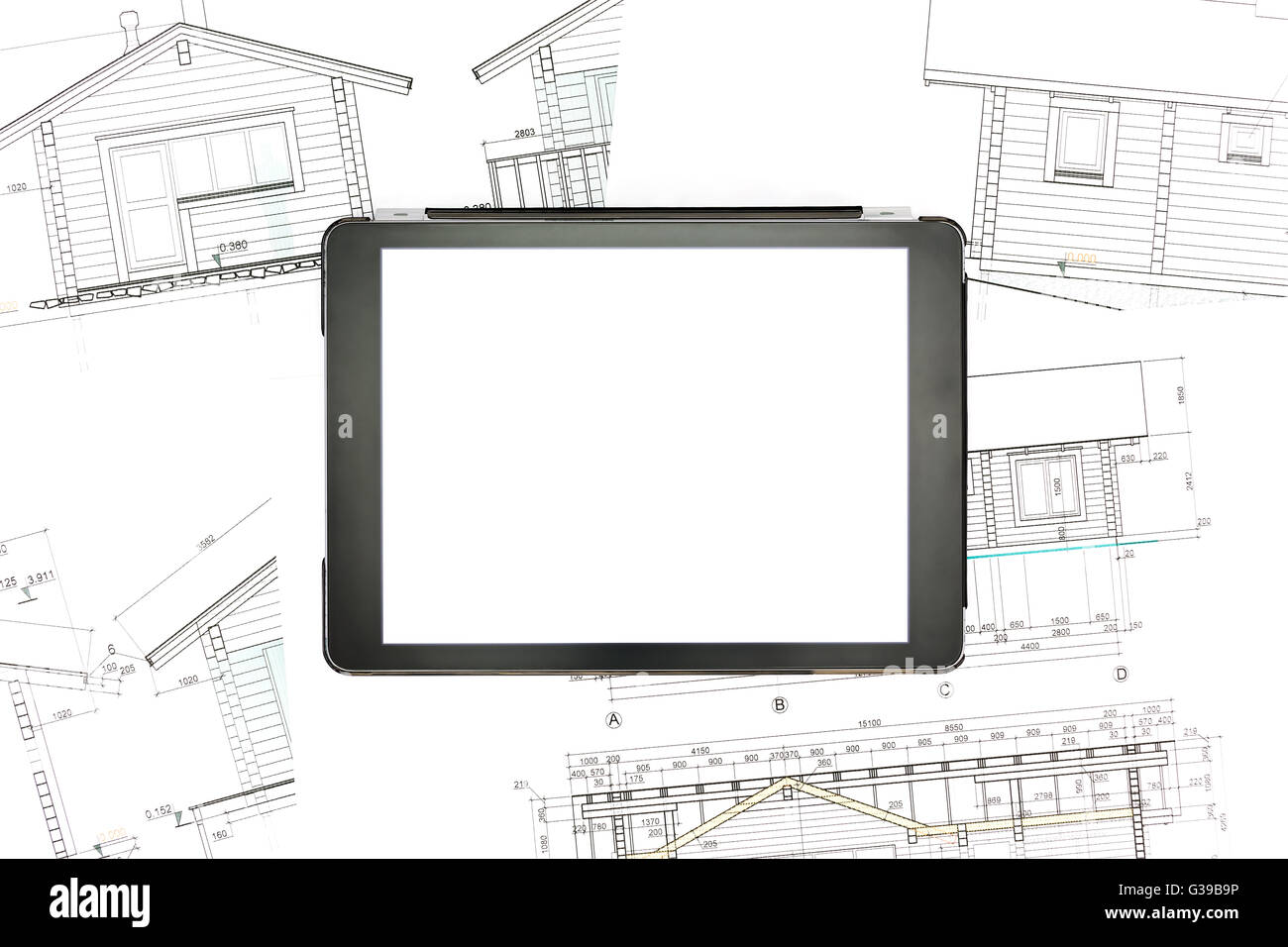 architectural background with blank digital tablet over blueprints ...