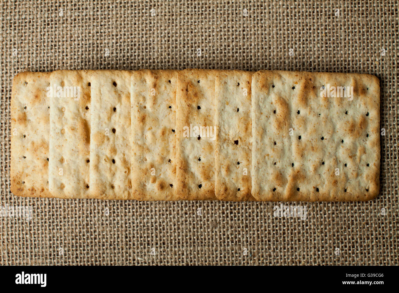 Crackers arranged in line Stock Photo - Alamy
