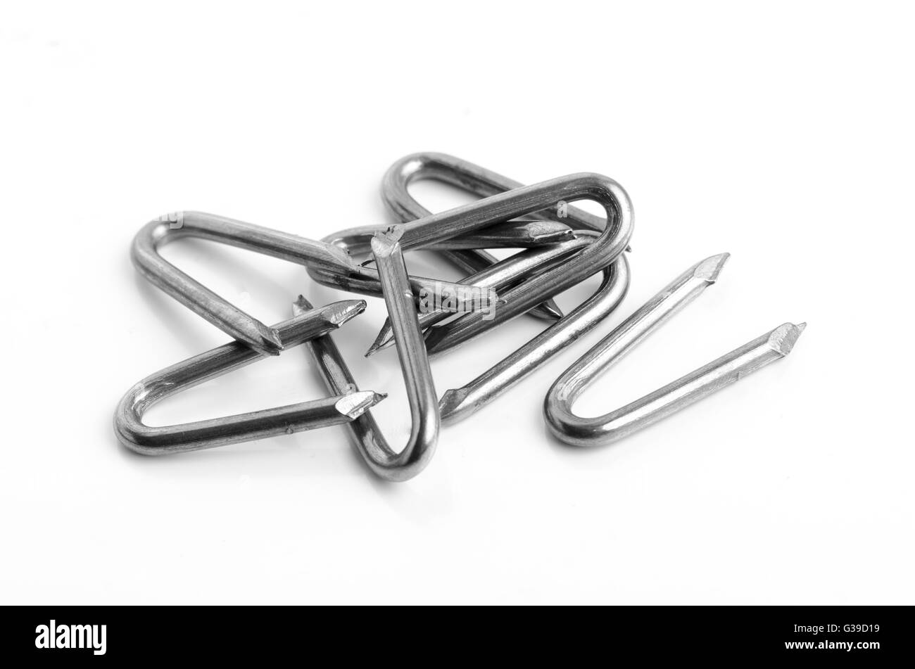 Many metal bent circular nails for wood blending isolated on white ...