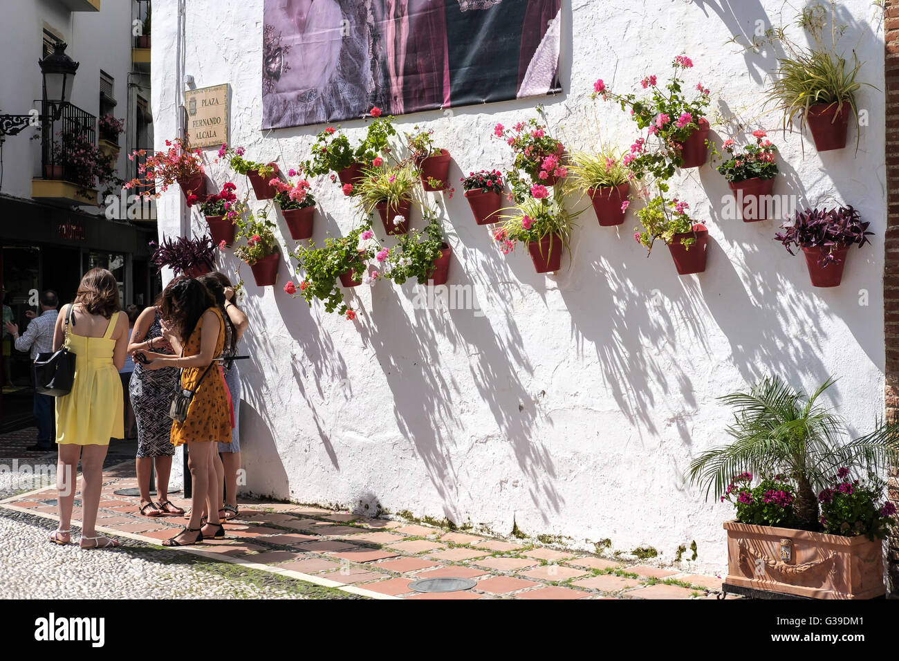 Street Scene Plaza Fernando Alcala in Marbella Stock Photo - Alamy