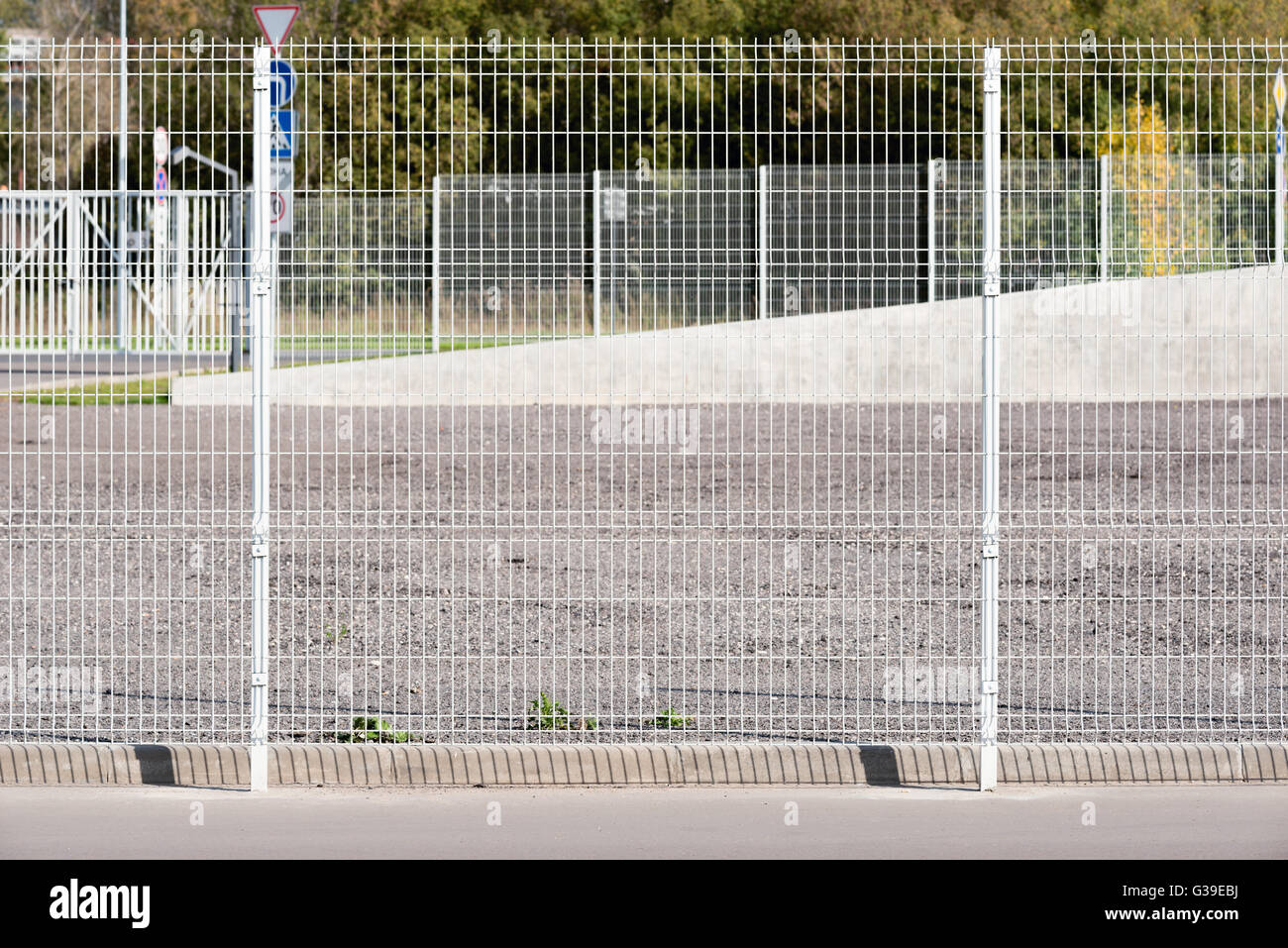 Metal fence by the stadium Stock Photo - Alamy